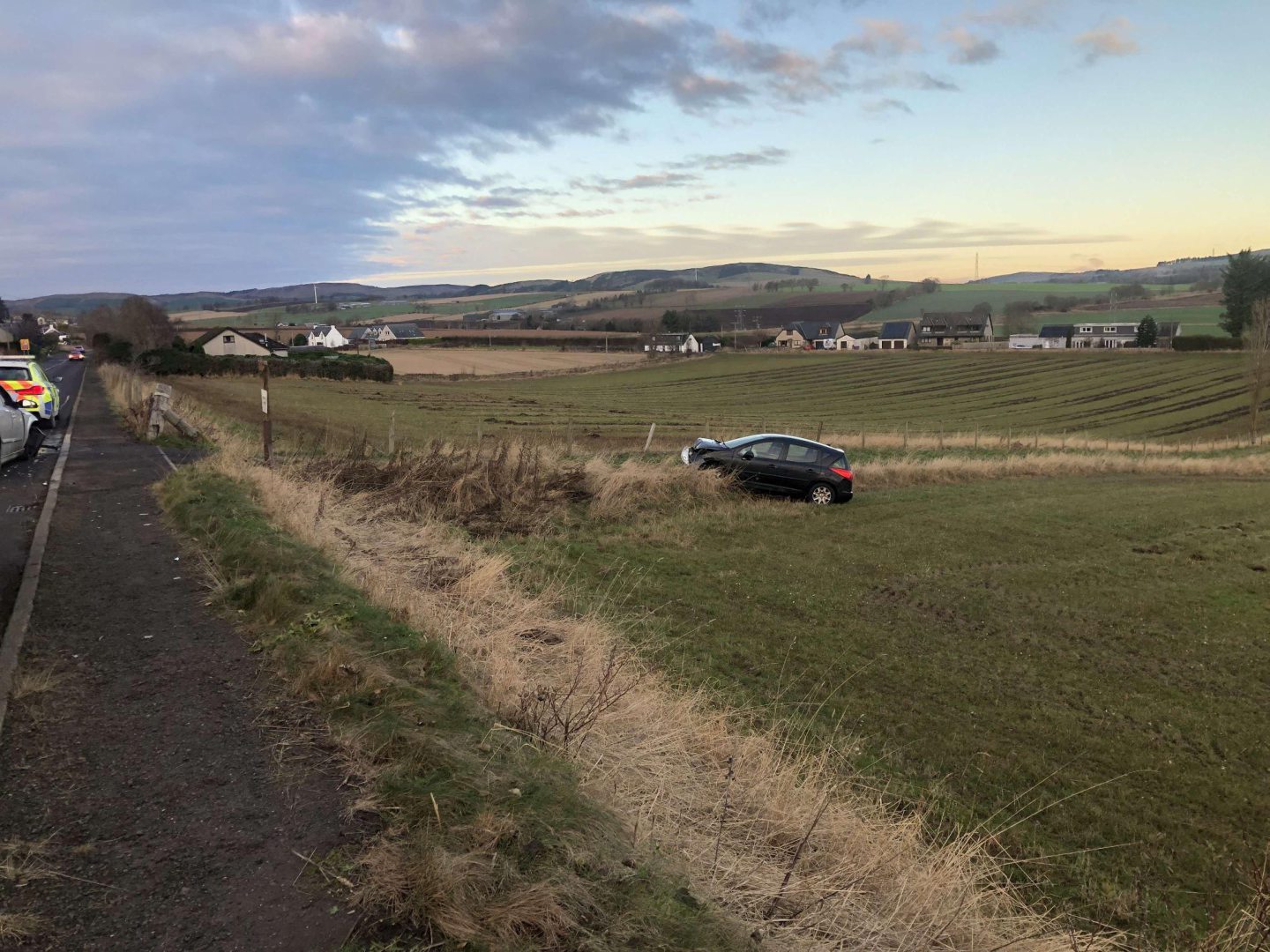 Two people taken to hospital after crash near Muirhead in Angus
