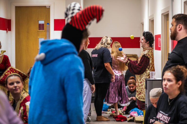 Behind the curtain: The magic of a Dundee pantomime community - The Courier
