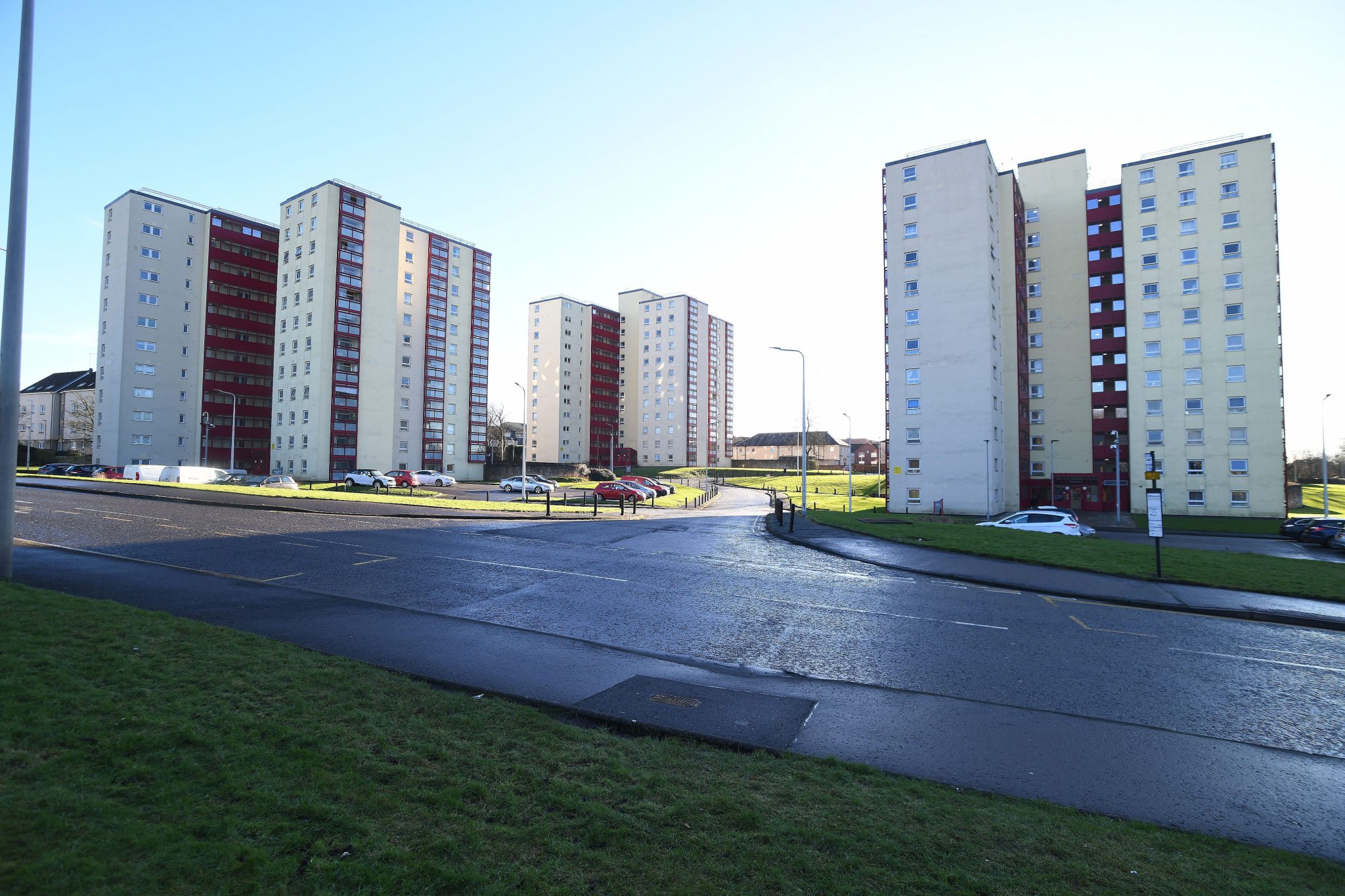 Forensics officers at Dunfermline flats as police carry out raid