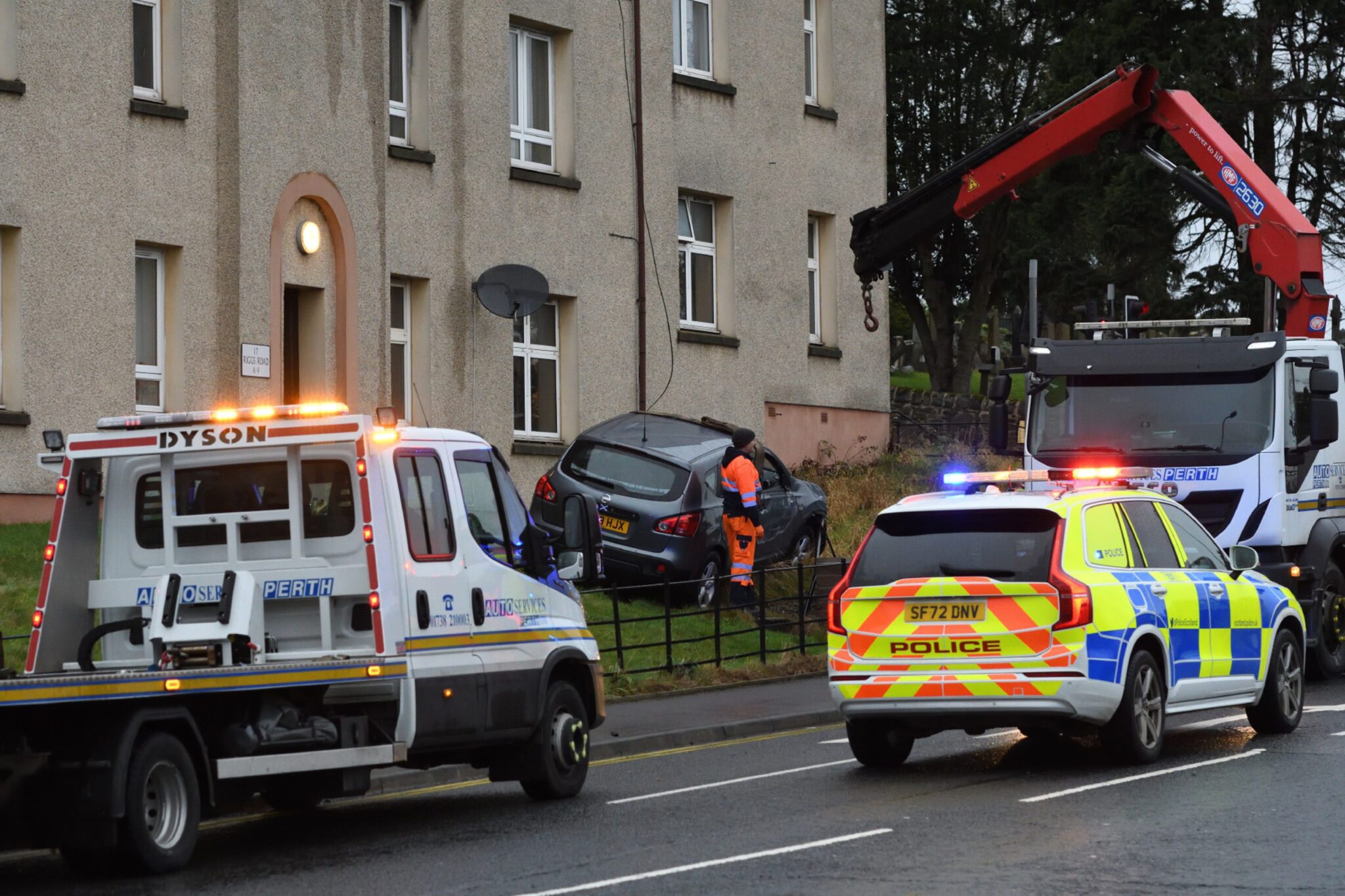 Riggs Road: Car crashes through railings outside Perth flats