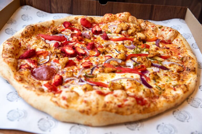 We try the 18-inch whoppers at new Dundee pizzeria Slice n Eazy