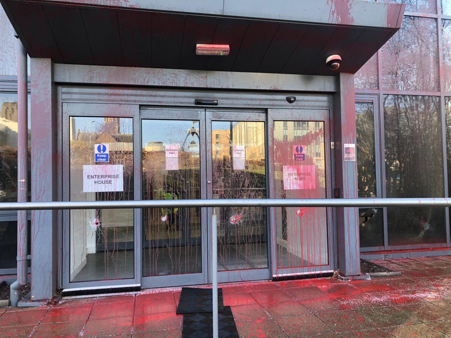 Protesters target Dundee offices with red paint & smashed windows