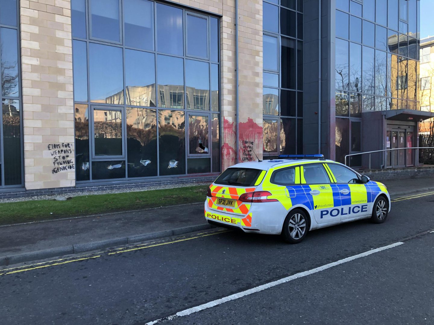 Protesters target Dundee offices with red paint & smashed windows