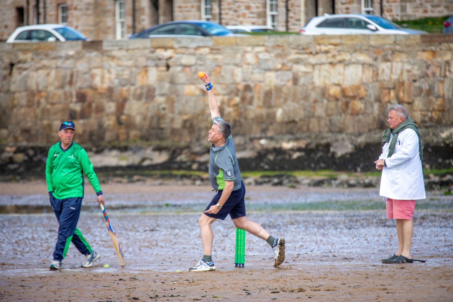 Ally McCoist plays wicketkeeper in beach cricket match at Elie