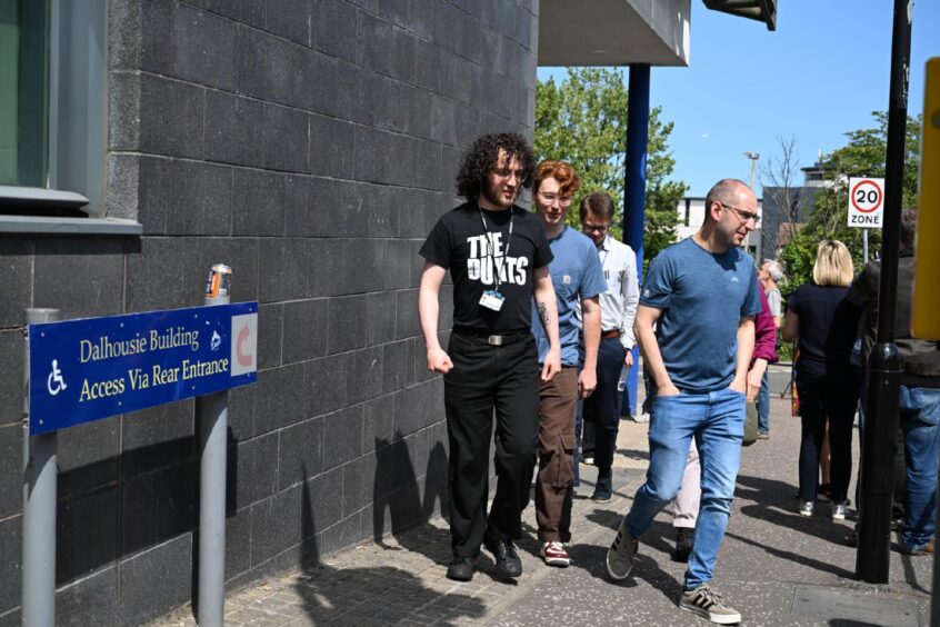 Dundee University staff and students react to damning crisis report