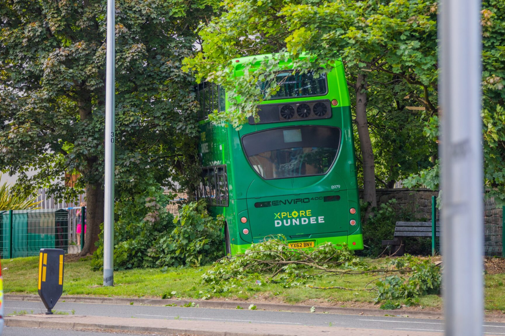 Driver hospitalised and two injured in Dundee Dens Road bus crash