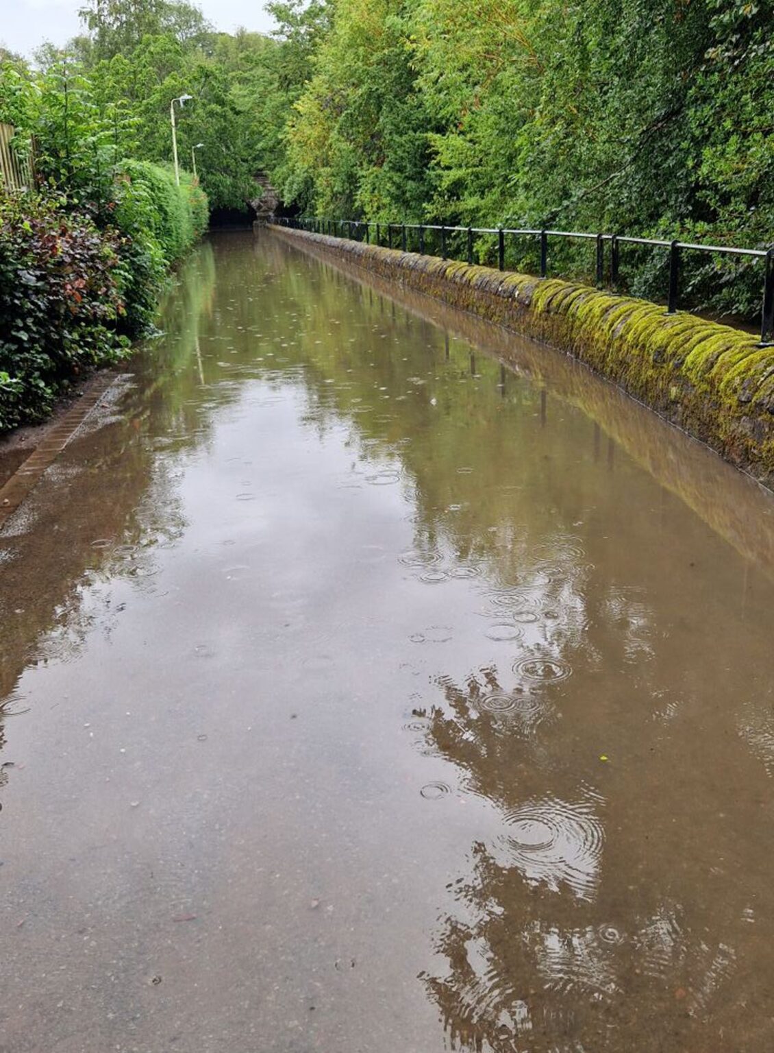 Videos show flash flooding after heavy rainfall in Perth