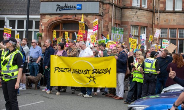 Anti-immigration groups and counter-protesters in Perth stand-off