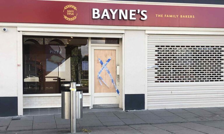 Police tape off Bayne's bakery in Lochee, Dundee, after break-in