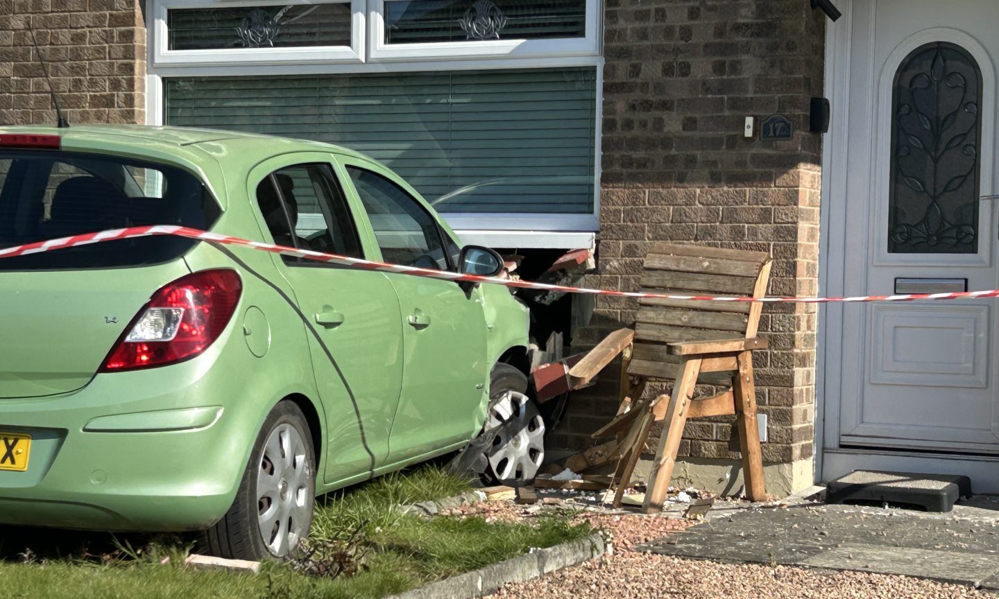 Fife residents hospitalised after car crashes into their front room