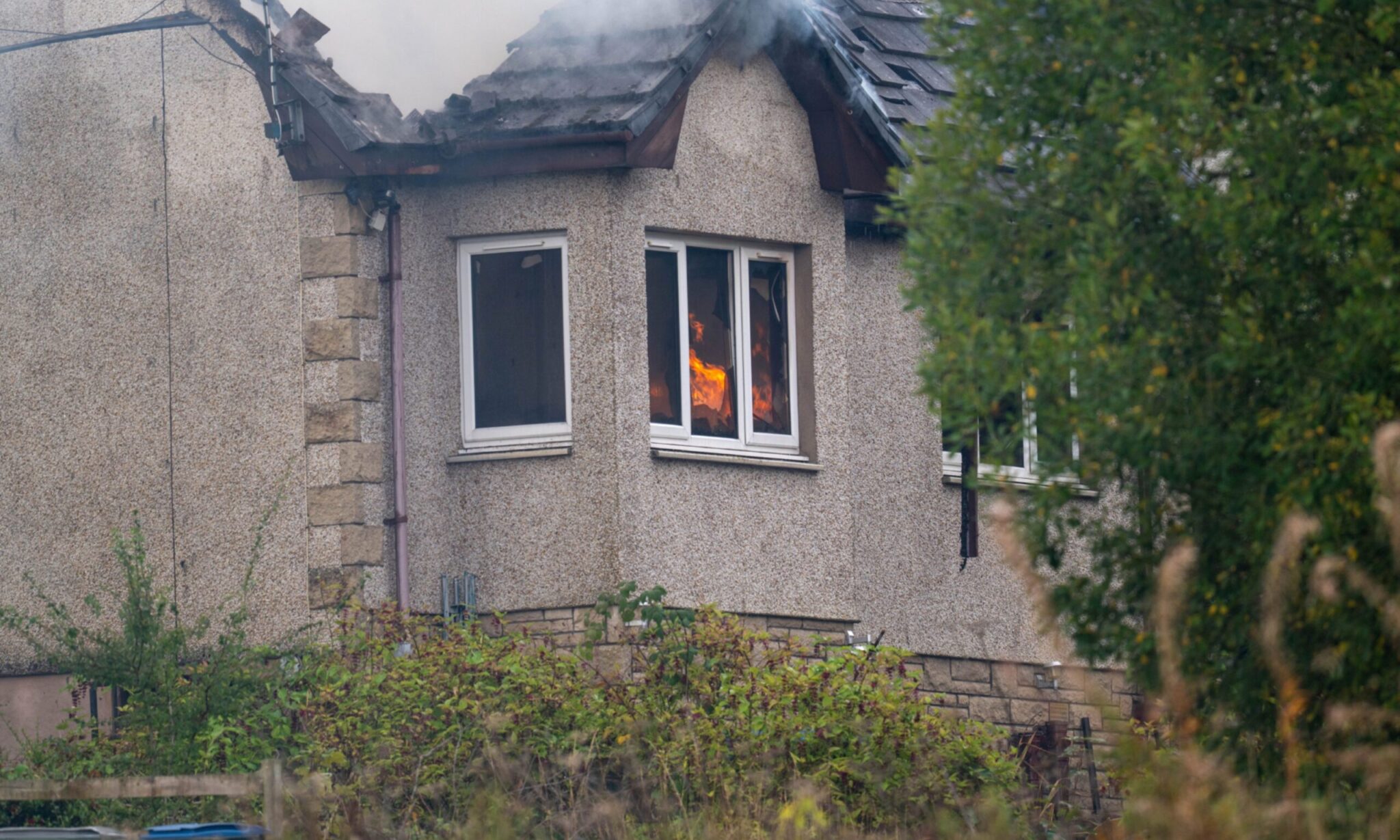 Several fire crews battle Perth house blaze for eight hours