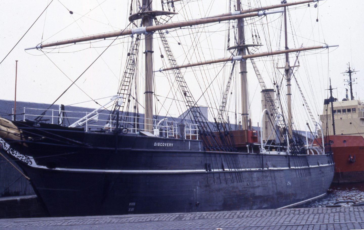 Colour photos show RRS Discovery in Dundee in the 1980s