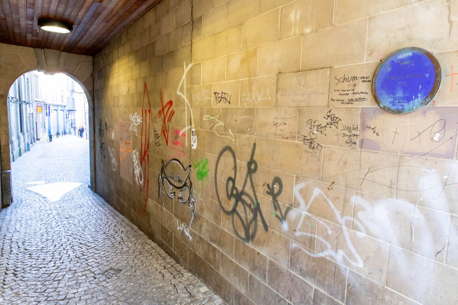 Dundee fancy dress shop blocks graffiti with Halloween murals