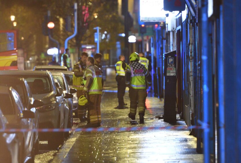 Perth High Street residents 'evacuated' and road closed for flat fire