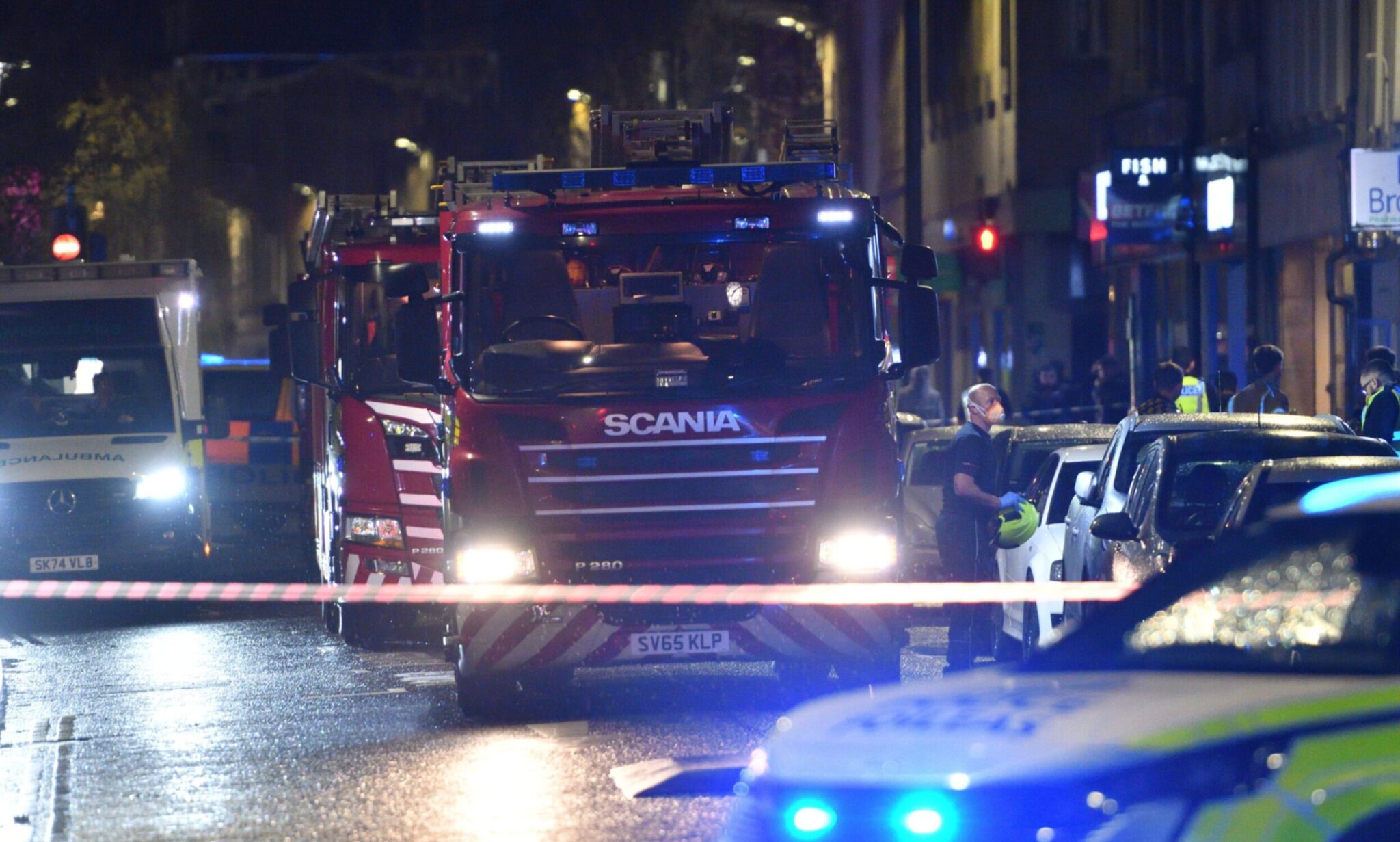Perth High Street residents 'evacuated' and road closed for flat fire