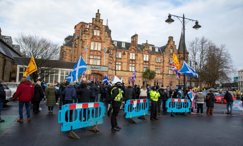 John Swinney considers buffer zones after 'disgusting' Perth protest