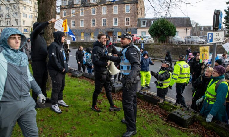 Anti-immigration protesters charge at Perth hotel