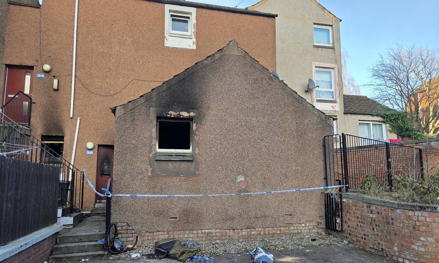 King Street: Police guard Dundee flat left badly damaged in fire