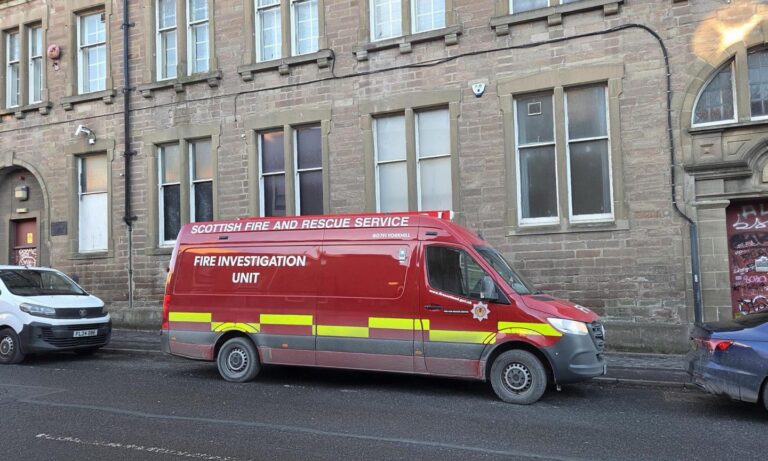 King Street: Police guard Dundee flat left badly damaged in fire