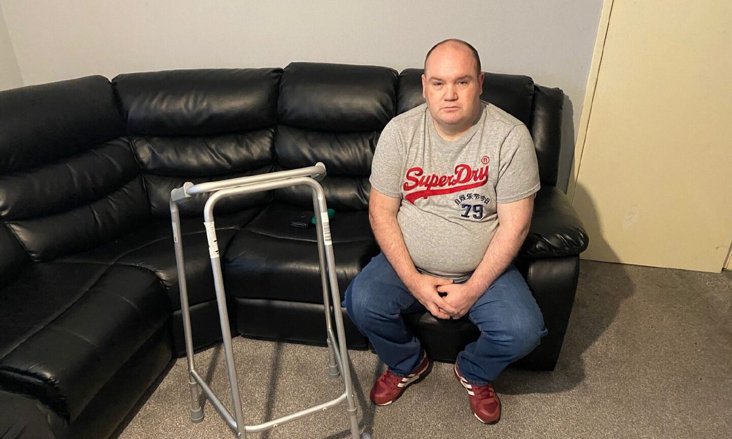 Disables Dundee dad wins police payout after being pinned down