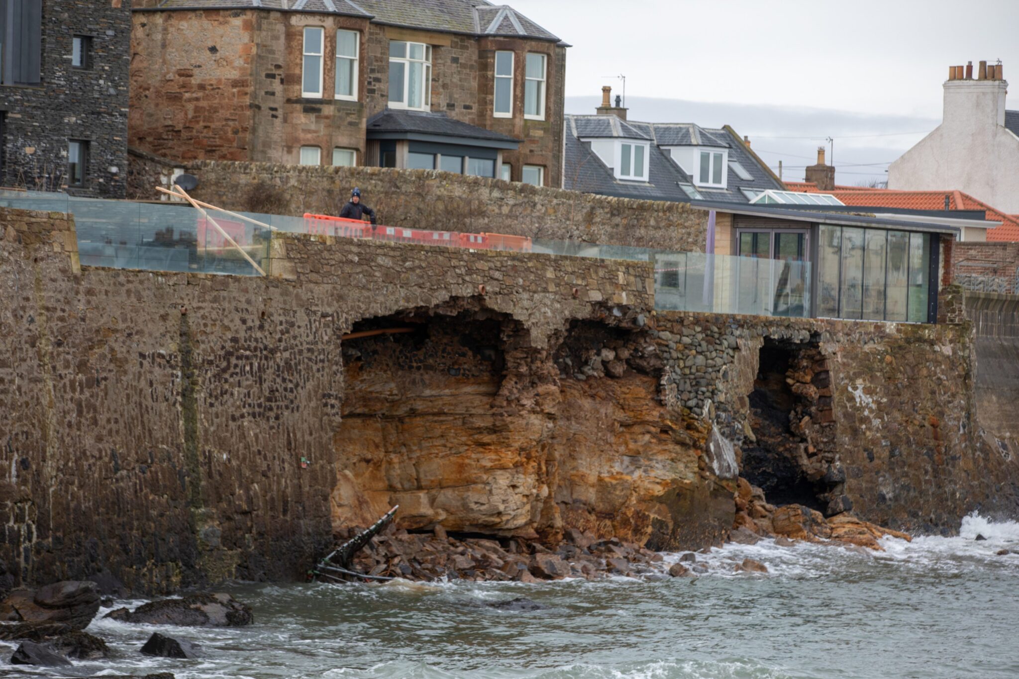 Urgent calls to fix collapsed sea wall below Fife beach house