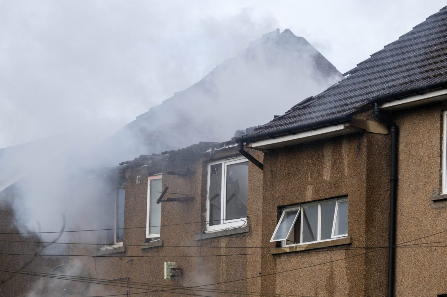 Fire 'completely destroys' roof of Lochee flat as locals evacuated