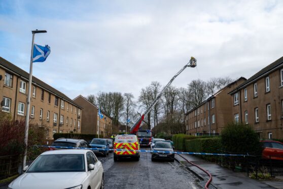 Fire 'completely destroys' roof of Lochee flat as locals evacuated