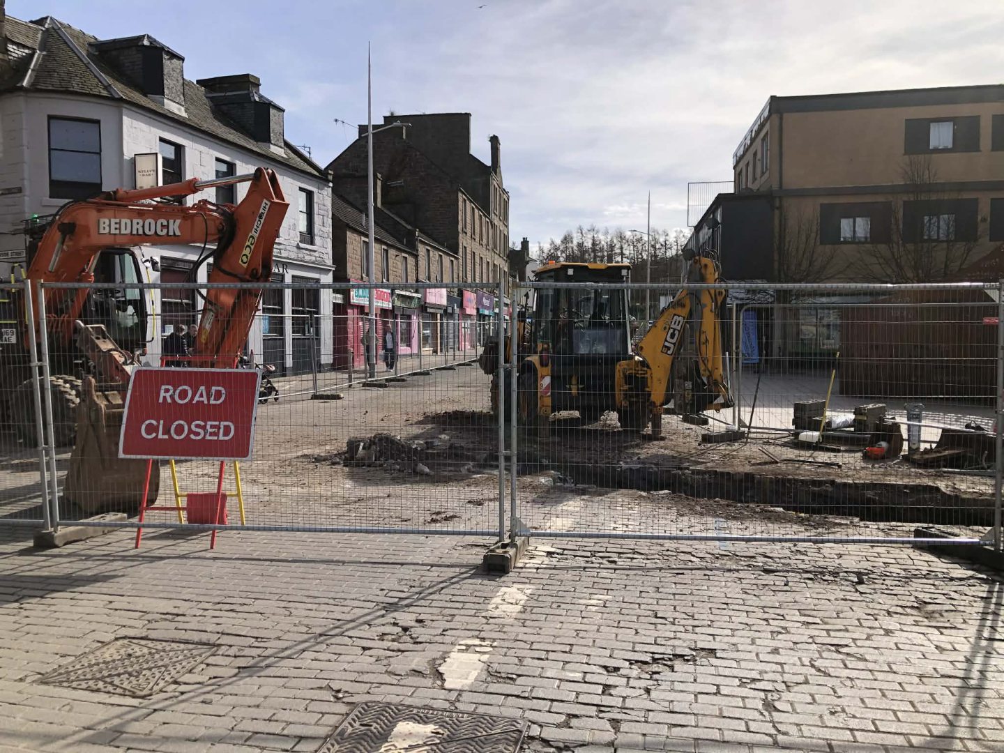 Huge hole in Lochee High Street as 20 weeks of work begins