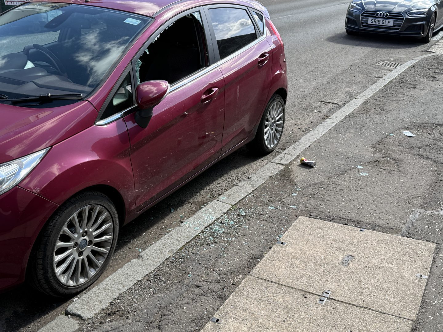 Video captures moment car windows smashed on Dundee street