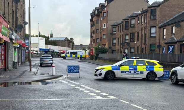 Police seal off Strathmartine Road in Dundee amid ongoing incident