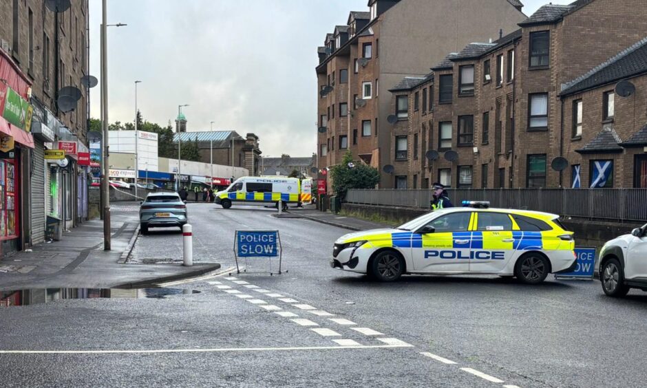 Police seal off Strathmartine Road in Dundee amid ongoing incident