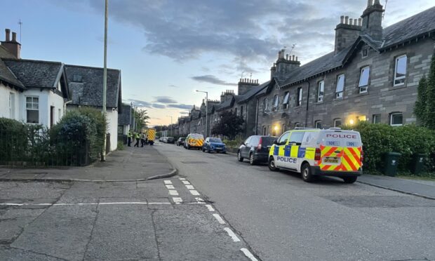 Person taken to hospital after armed police descend on Perth street