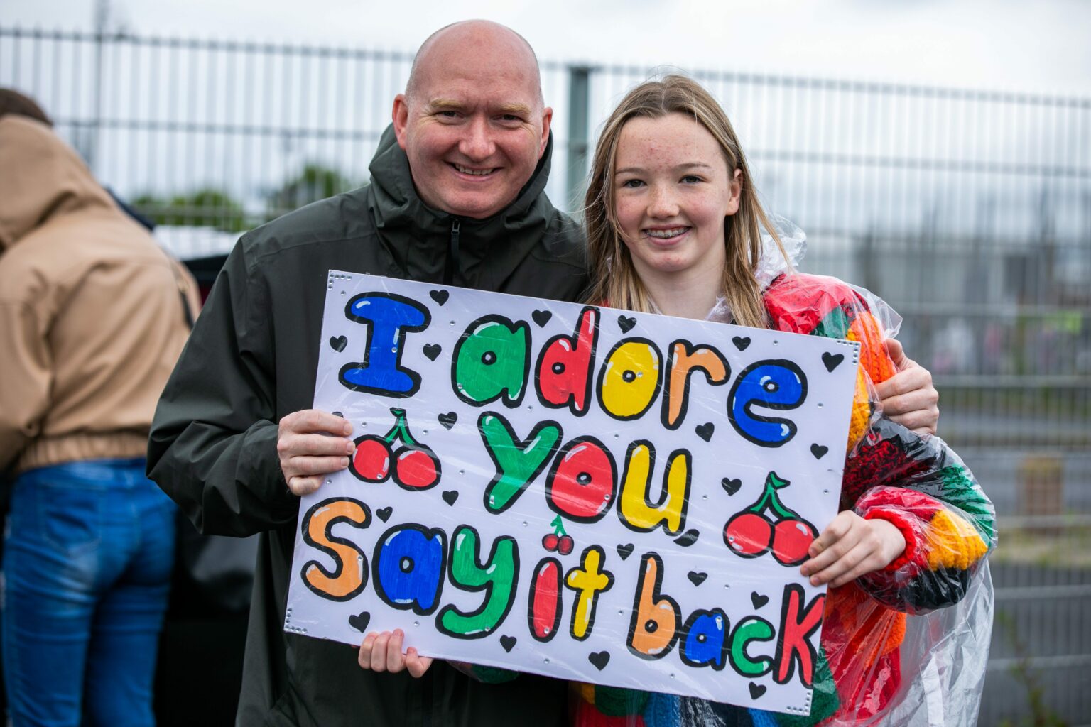 Harry Styles at Ibrox: Fans brave wet and windy weather for start of ...