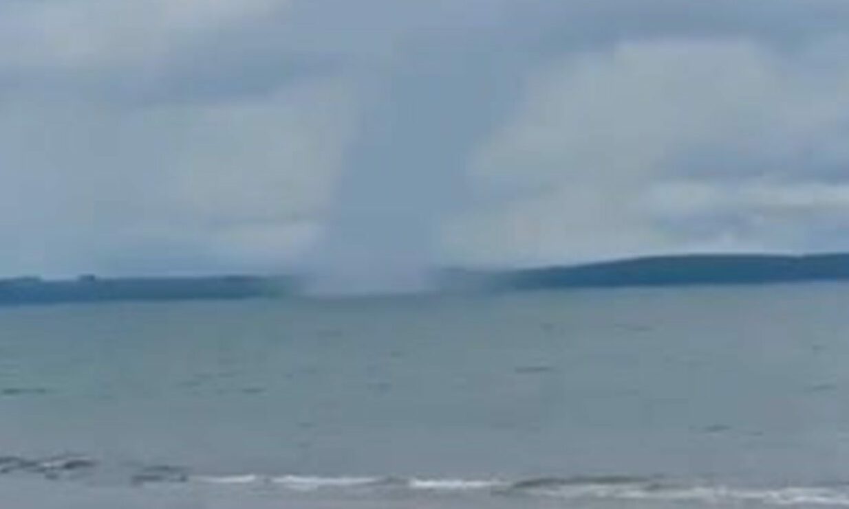 WATCH: Unusual water tornado as it rides the water on the Moray Firth ...