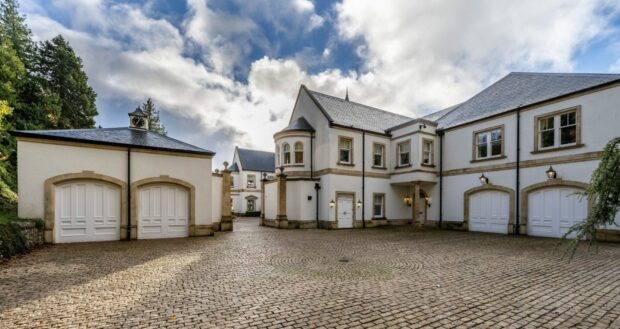 Stewart Milne's £7.5m mansion still for sale after 18 months