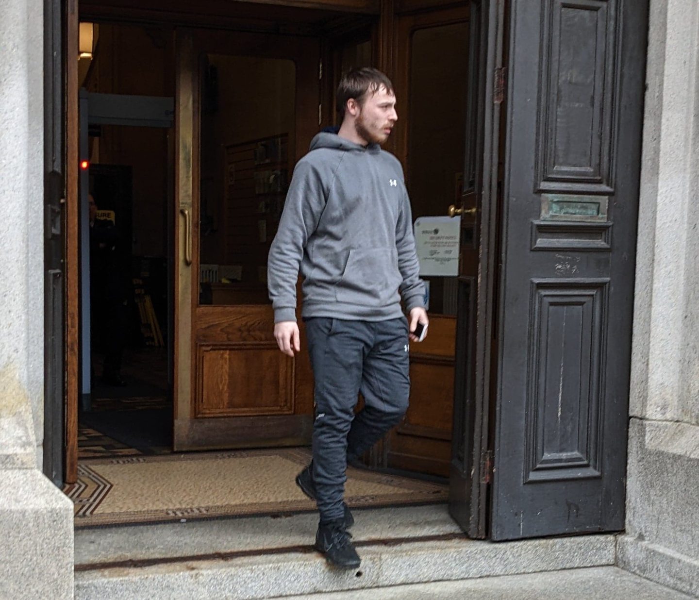 Man 'frightened' residents by trying to barge into their homes