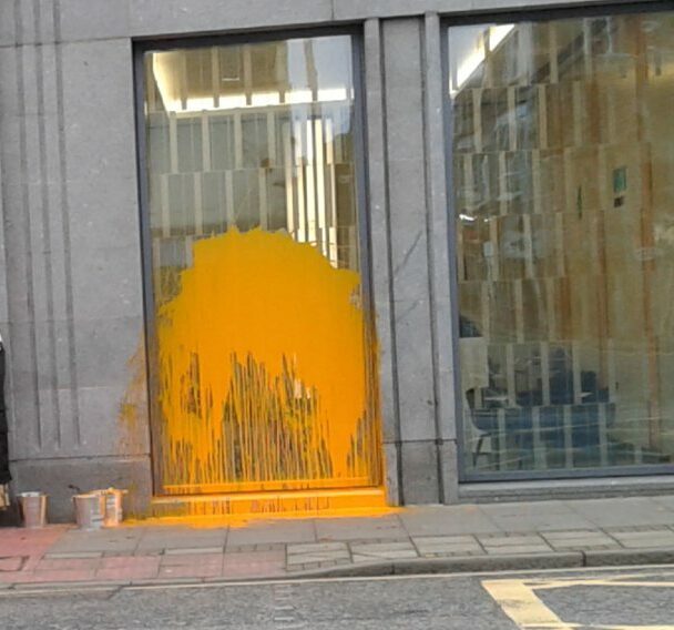 Trio deny breach of the peace over Aberdeen climate change paint protest