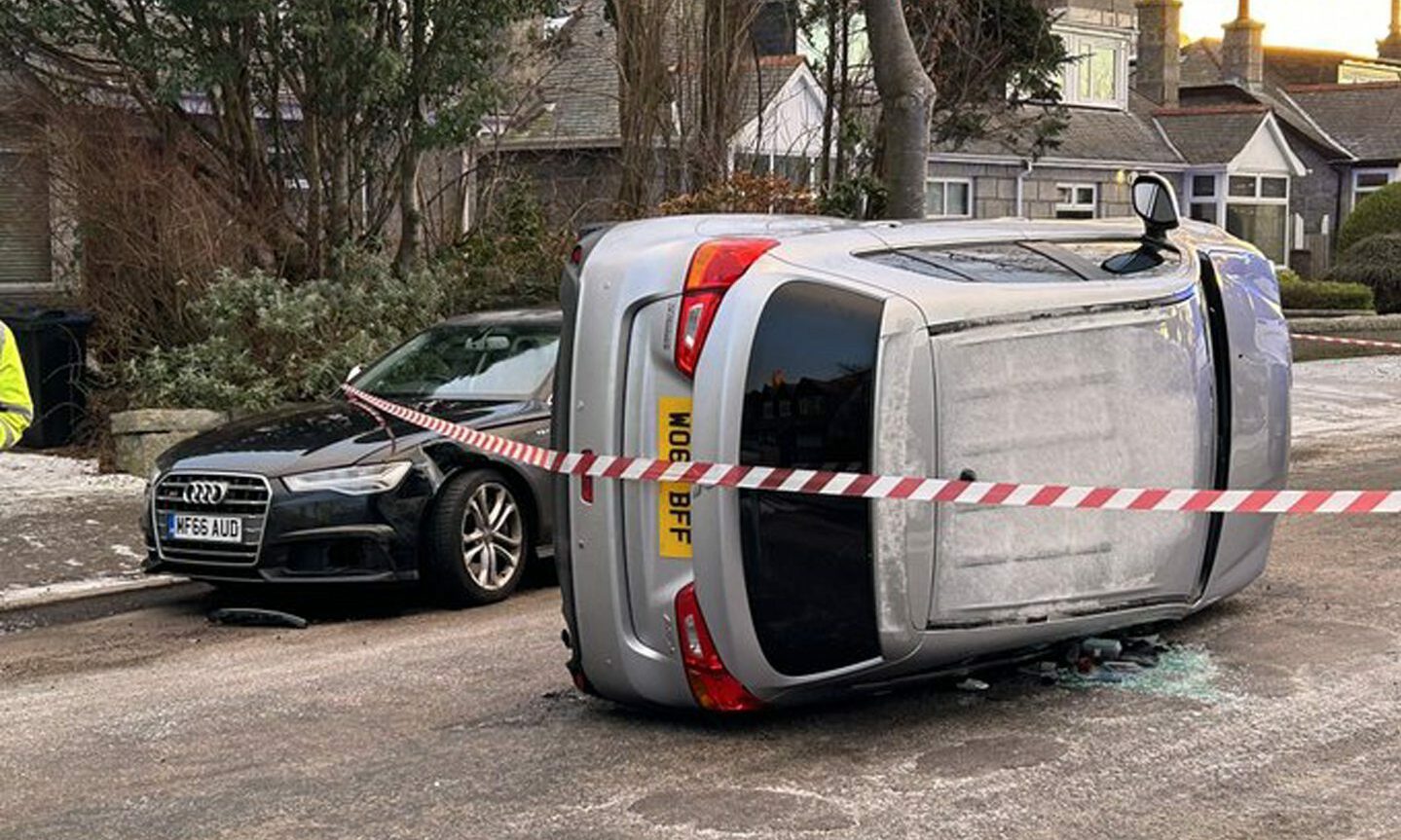 Car on its side following crash on Aberdeen residential street - Press ...