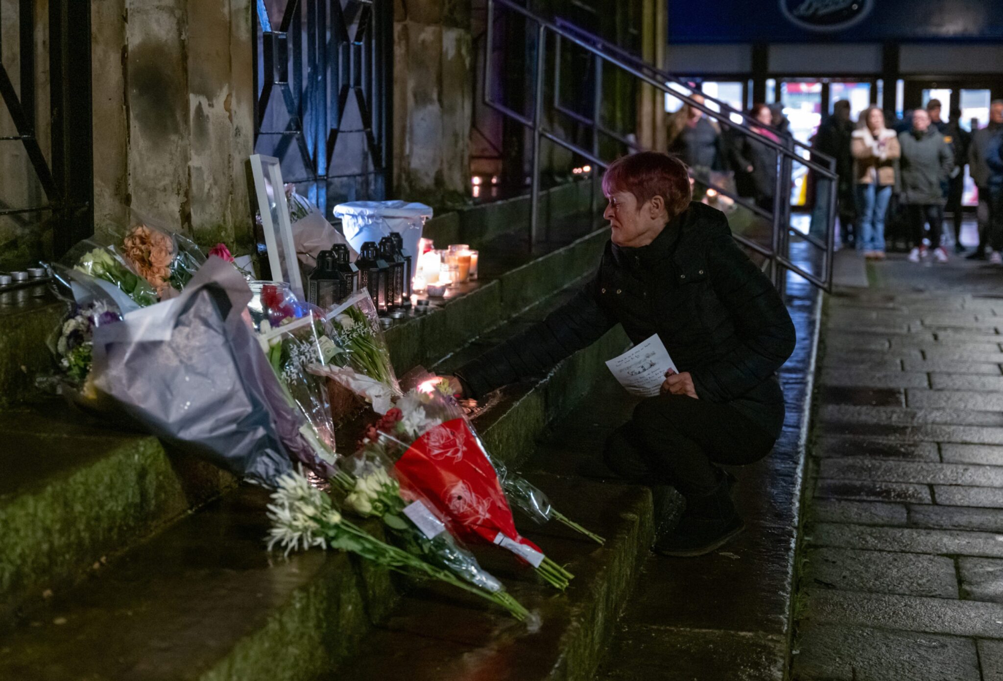 Elgin grieves 'murdered' Keith Rollinson during candlelight vigil