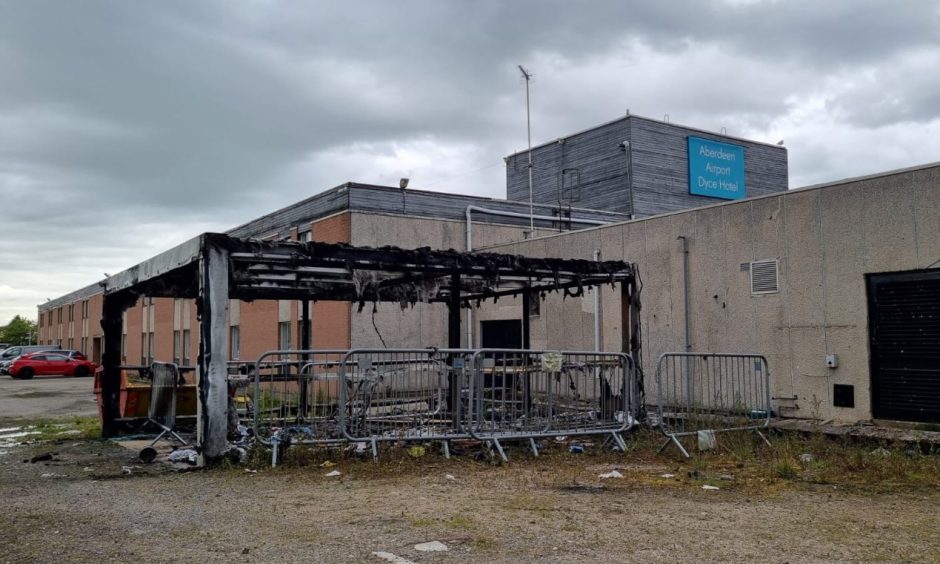 Plumes of smoke rise over Dyce hotel during bin shelter fire