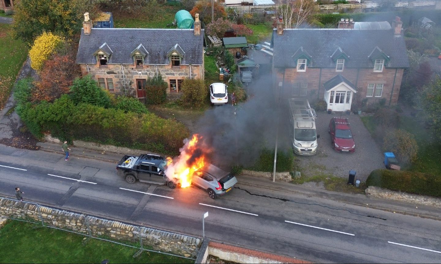 Firefighters battle car blaze after head-on crash in Evanton