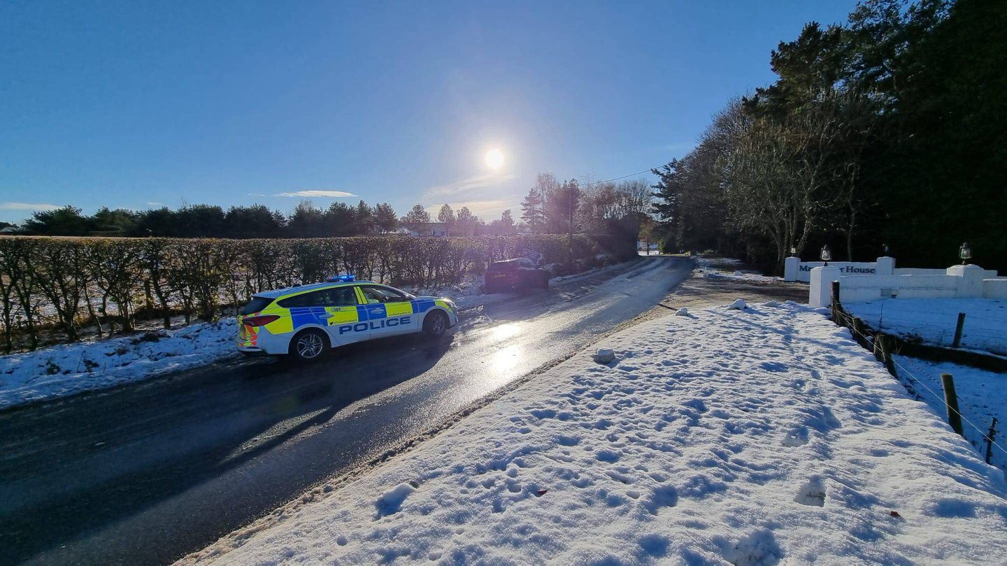 Black ice causes driver to crash into Deeside hotel sign