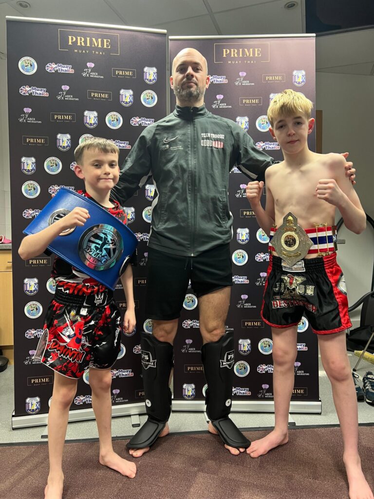 Aberdeen FC pair celebrate Jaxon Ritchie's Scottish Muay Thai title