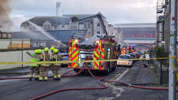 Crews battle fire at garage near Pittodrie stadium