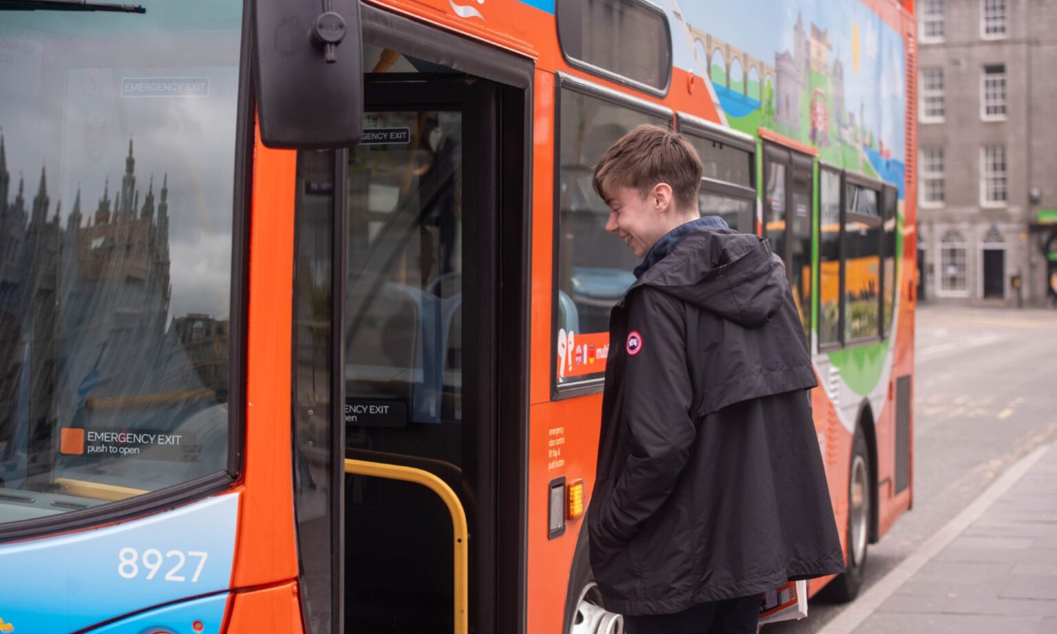 Aberdeen bus tourists on their open-top trip around city