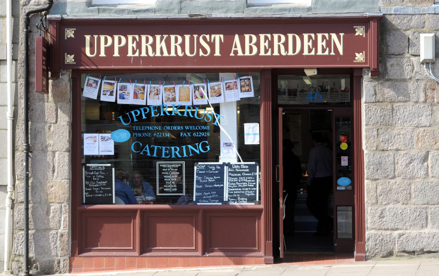 Jackie and Sheila hand over Upperkrust keys to new owners