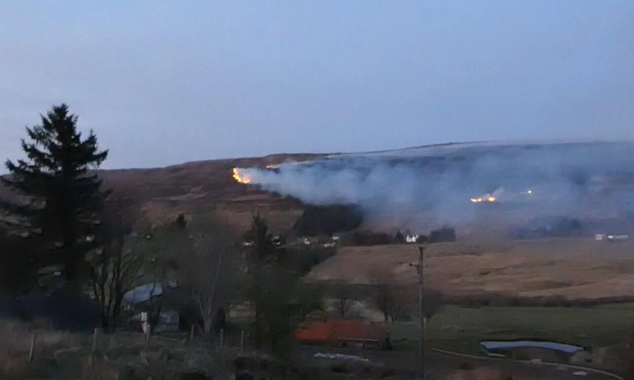 Firefighters battling Skye wildfire faced with wall of flame