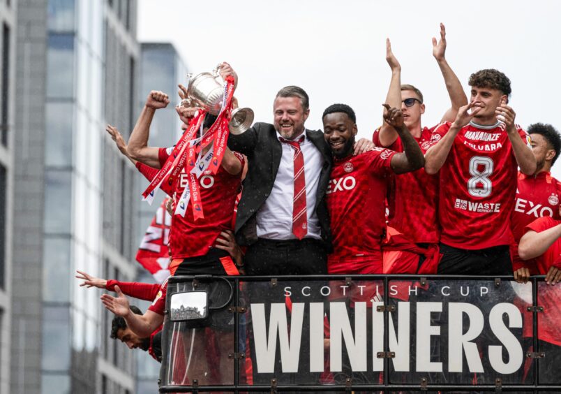 Dons mad runner celebrates cup win with fitness app sheep design