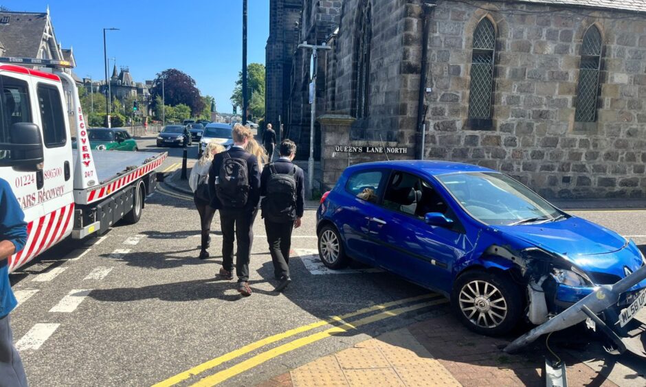 Armed police are at the scene of a crash in Aberdeen