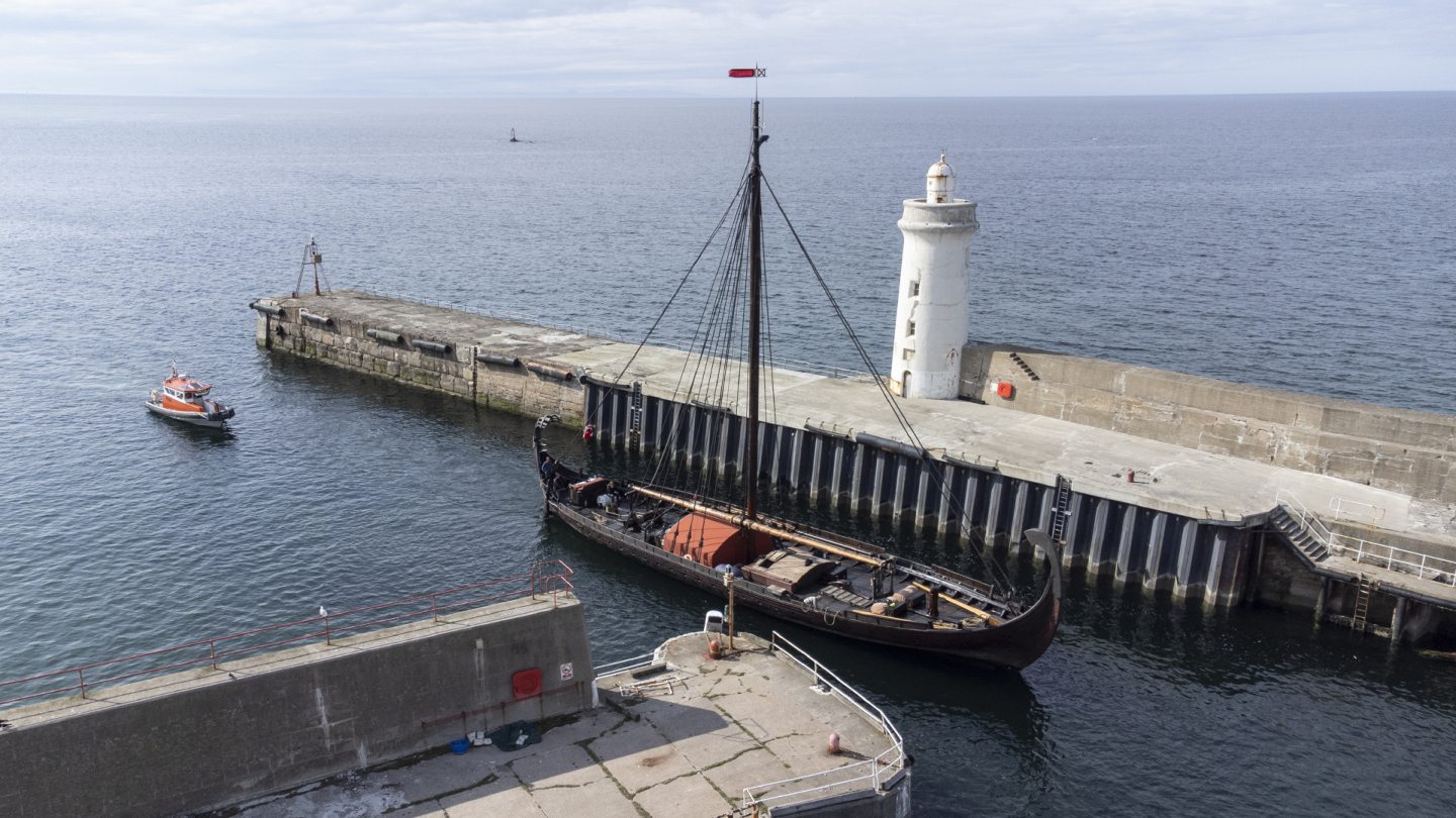 Drone shows Viking boat arrive in Buckie before Odyssey filming